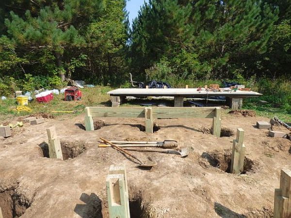 Cordwood Post & Pier Foundation - Cordwood Construction
