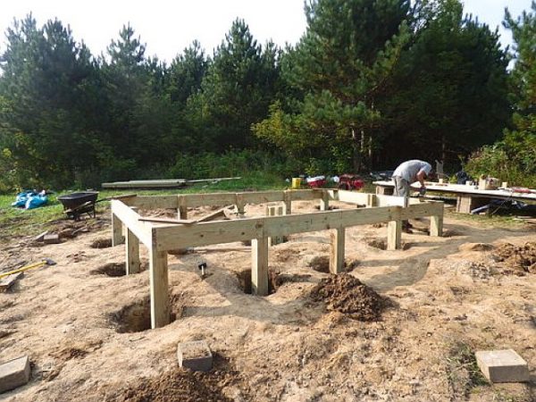 Cordwood Post & Pier Foundation - Cordwood Construction